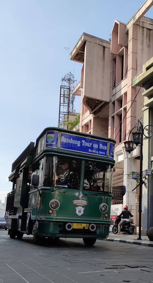 Bandung bus tour editorial image. Image of pedestrian - 263131175