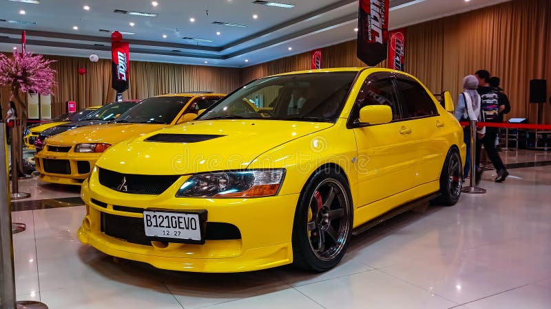 Yellow Mitsubishi Lancer Evolution IX Displayed in JDM Fest 2024 ...