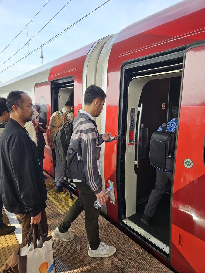 Passengers Queue To Enter the Train Editorial Stock Photo - Image of ...