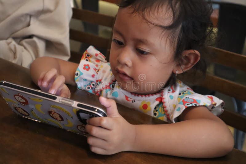 Children are Playing at the Dining Table Editorial Image - Image of ...