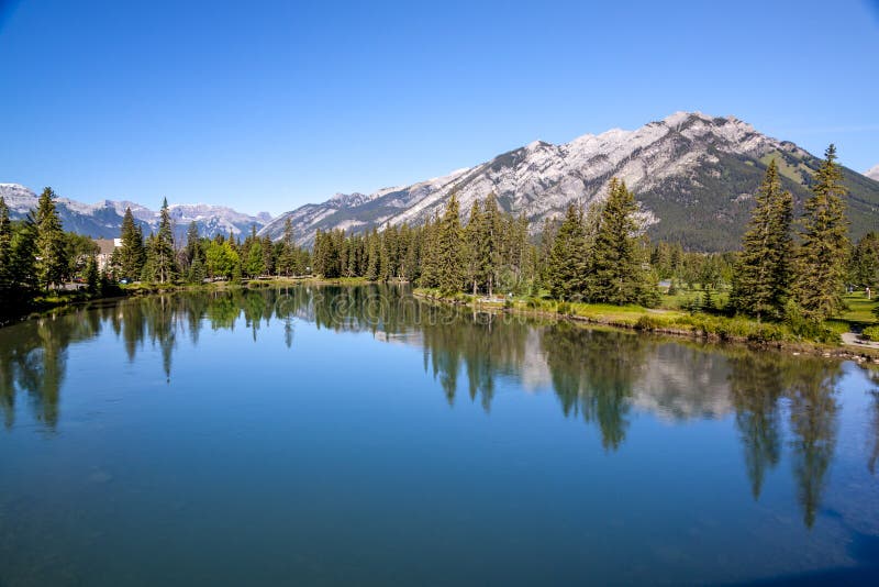 Banff - River Bow with Rocky Mountain Backdrop Stock Image - Image of ...