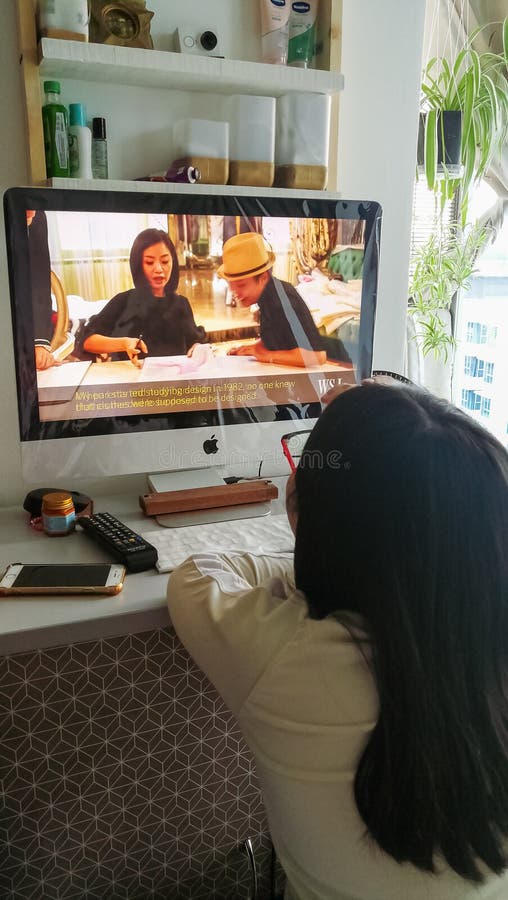 Young Girl Using Computer at Home. View from Behind Editorial Stock ...