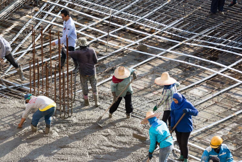 BANGKOK THAILAND -July 10, 2018: Labourers Work on a City Centre ...