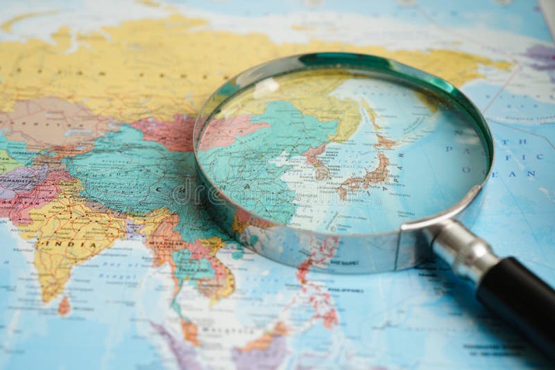 Bangkok, Thailand - May 15, 2022 Magnifying Glass on World Map Stock ...