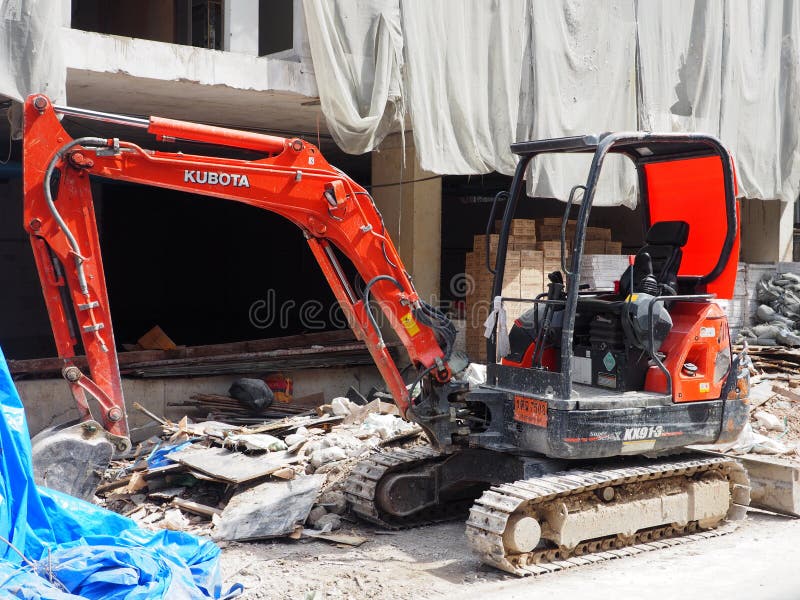 Compact Excavator at a Construction Site Editorial Image - Image of ...
