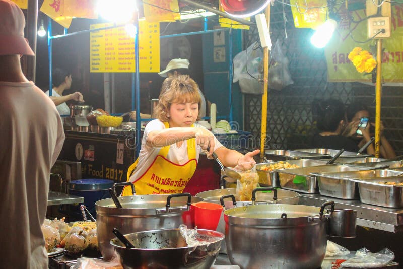 Bangkok Thailand October 2017 Pretty Thai Woman Cooking Food In Street Stall Of Yaowarat