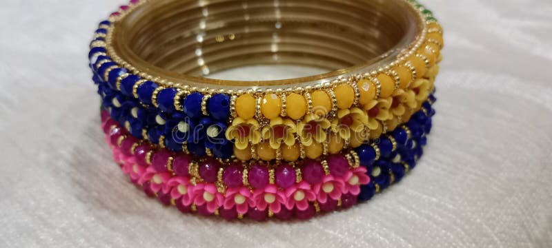 A Bangle Image with Colour Combination Yellow, Pink and Blue. Stock ...