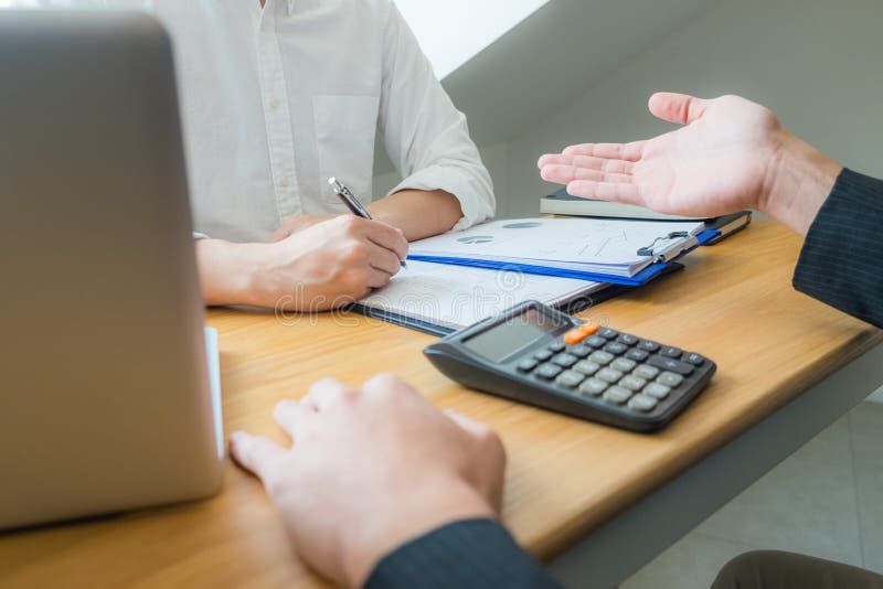 Bank Employees Sit and Work and Check the Financial Summary..Working in ...