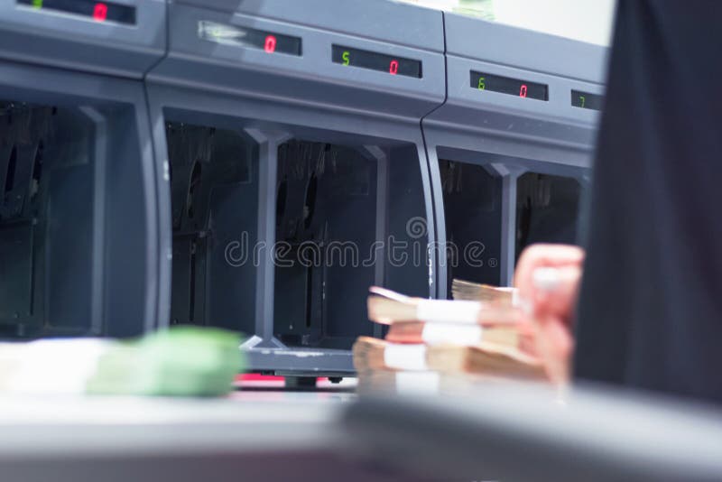Bank Employees Sorting and Counting Money Inside Bank Vault. Large ...