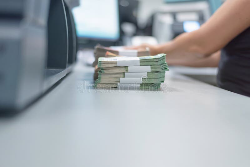 Bank Employees Sorting and Counting Money Inside Bank Vault. Large ...
