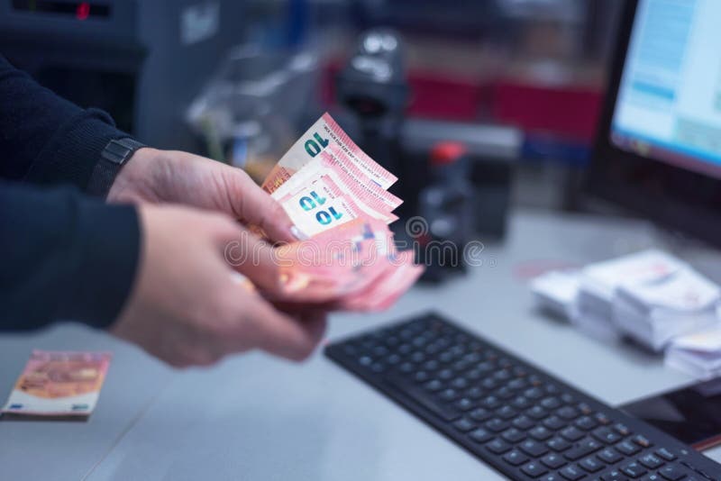Bank Employees Sorting and Counting Money Inside Bank Vault. Large ...