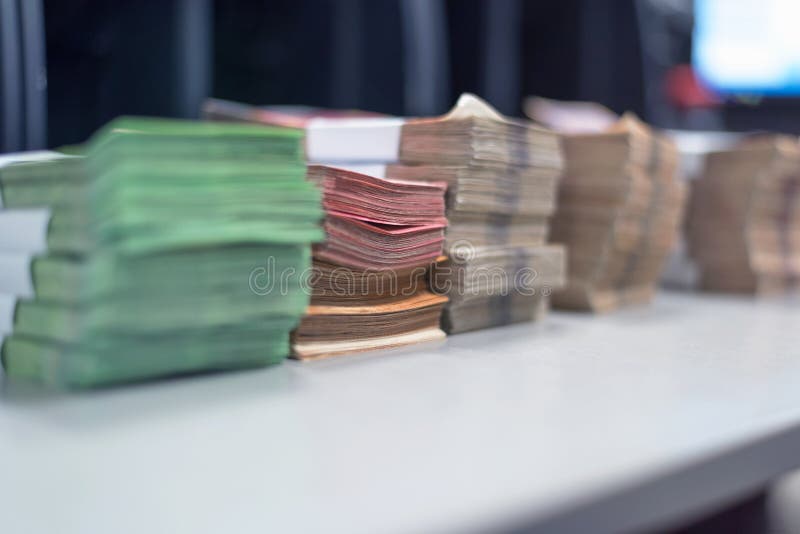 Bank Employees Sorting and Counting Money Inside Bank Vault. Large ...