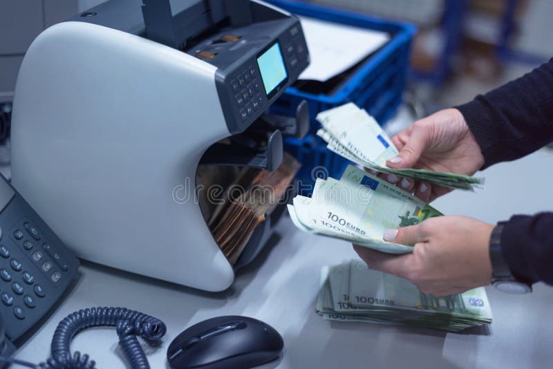 Bank Employees Sorting and Counting Money Inside Bank Vault. Large ...