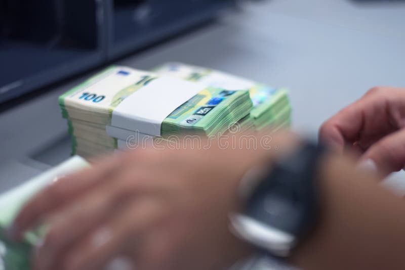 Bank Employees Sorting and Counting Money Inside Bank Vault. Large ...