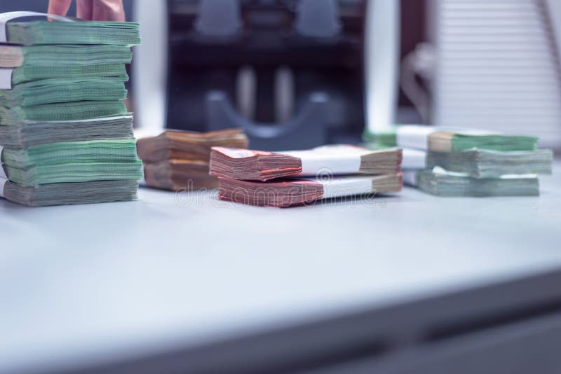 Bank Employees Sorting and Counting Money Inside Bank Vault. Large ...