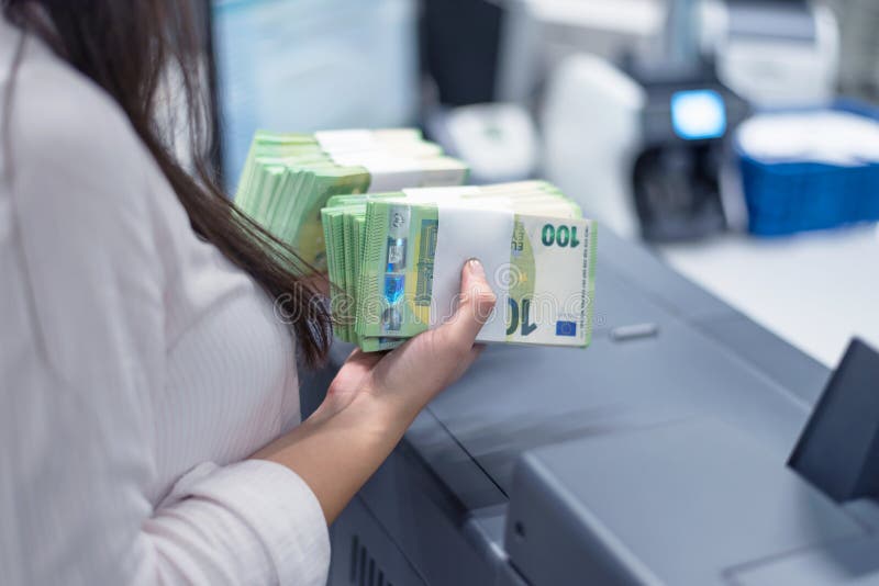Bank Employees Sorting and Counting Money Inside Bank Vault. Large ...