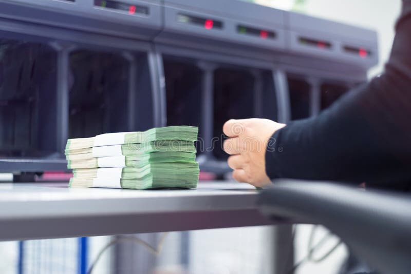 Bank Employees Sorting and Counting Money Inside Bank Vault. Large ...