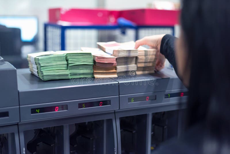 Bank Employees Sorting and Counting Money Inside Bank Vault. Large ...