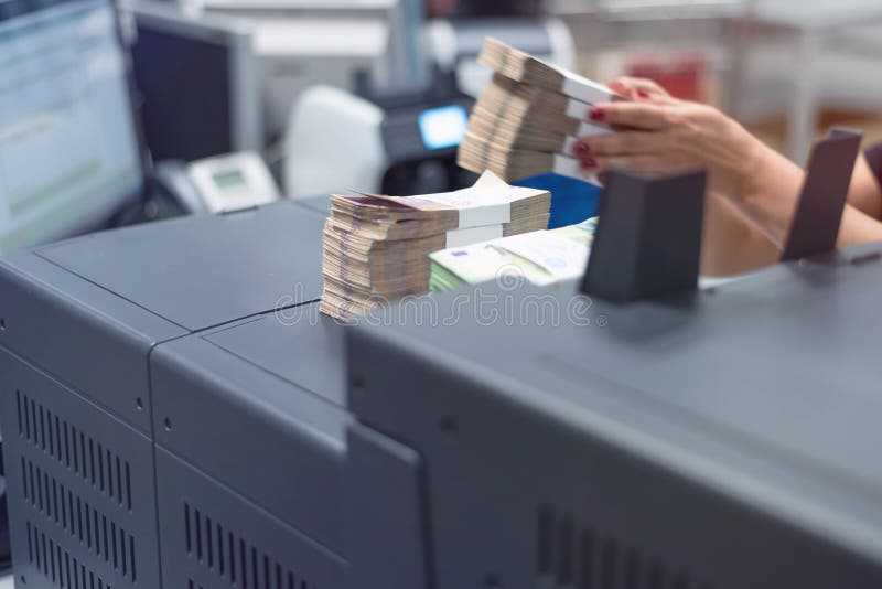 Bank Employees Sorting and Counting Money Inside Bank Vault. Large ...