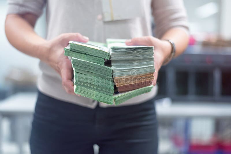 Bank Employees Sorting and Counting Money Inside Bank Vault. Large ...