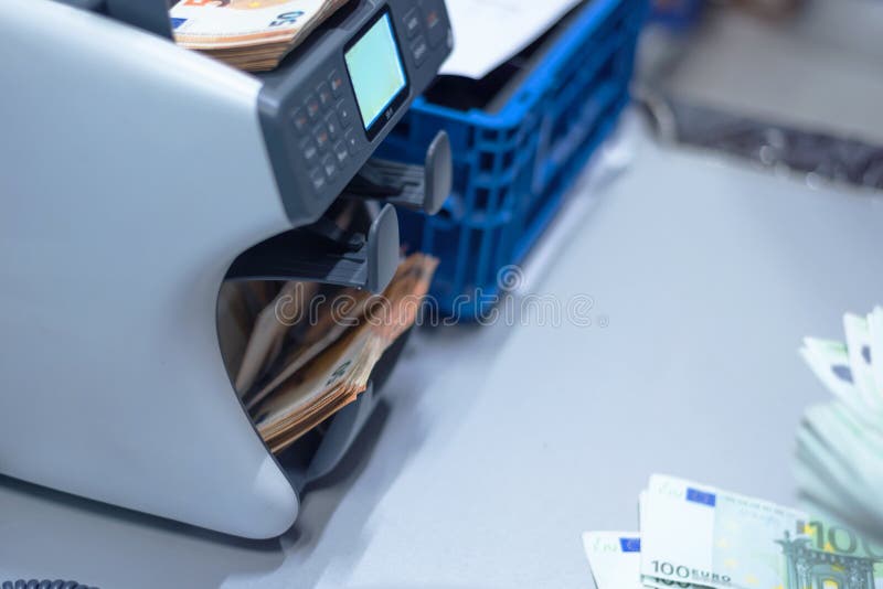 Bank Employees Sorting and Counting Money Inside Bank Vault. Large ...