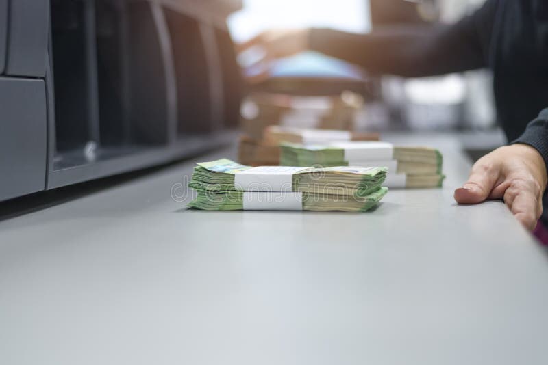 Bank Employees Sorting and Counting Money Inside Bank Vault. Large ...