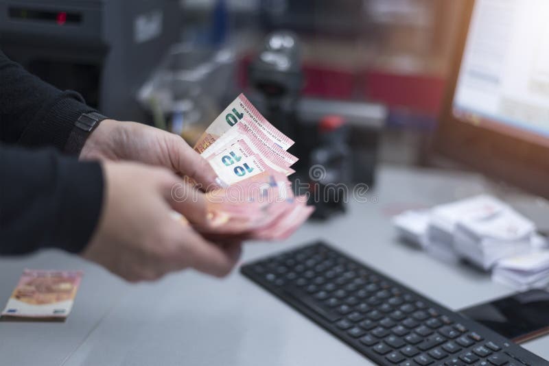 Bank Employees Sorting and Counting Money Inside Bank Vault. Large ...