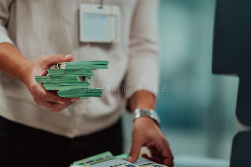Bank Employees Using Money Counting Machine while Sorting and Counting ...