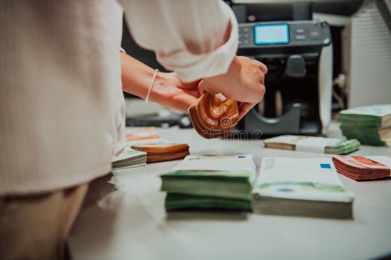 Bank Employees Using Money Counting Machine while Sorting and Counting ...