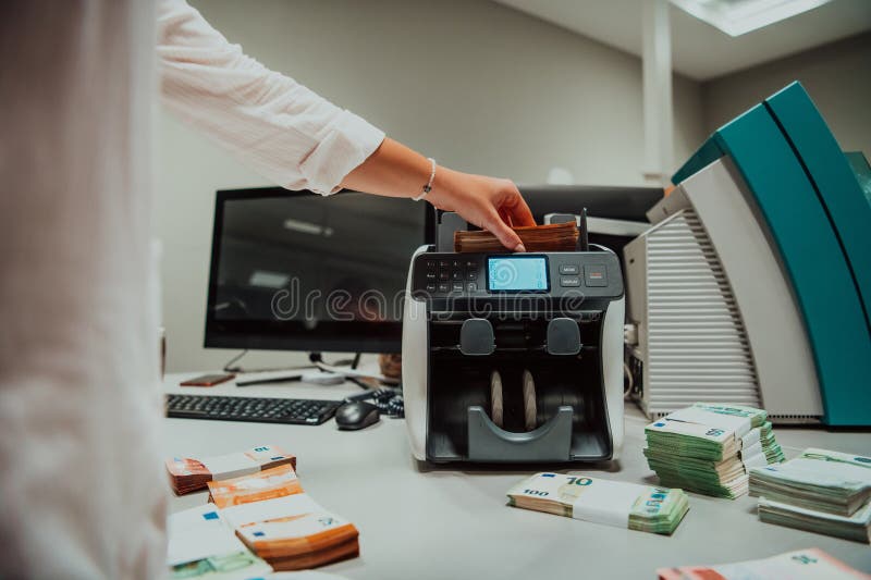 Bank Employees Using Money Counting Machine while Sorting and Counting ...