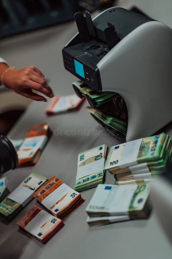 Bank Employees Using Money Counting Machine while Sorting and Counting ...