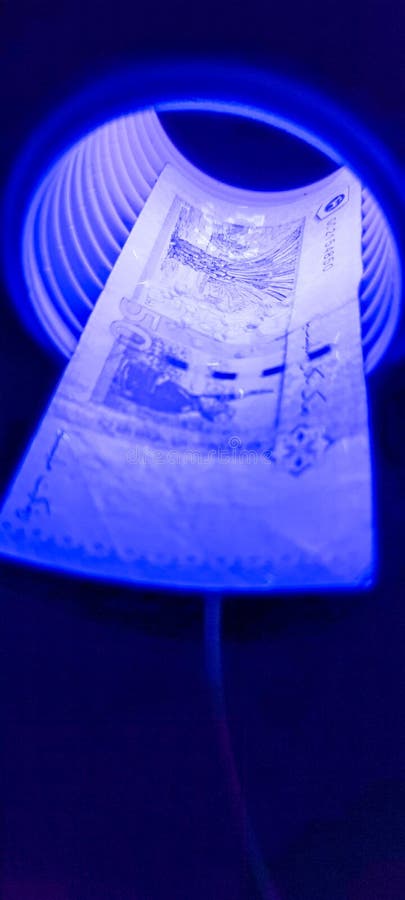 The Bank Note is in the Ultraviolet Light Stock Photo - Image of violet ...