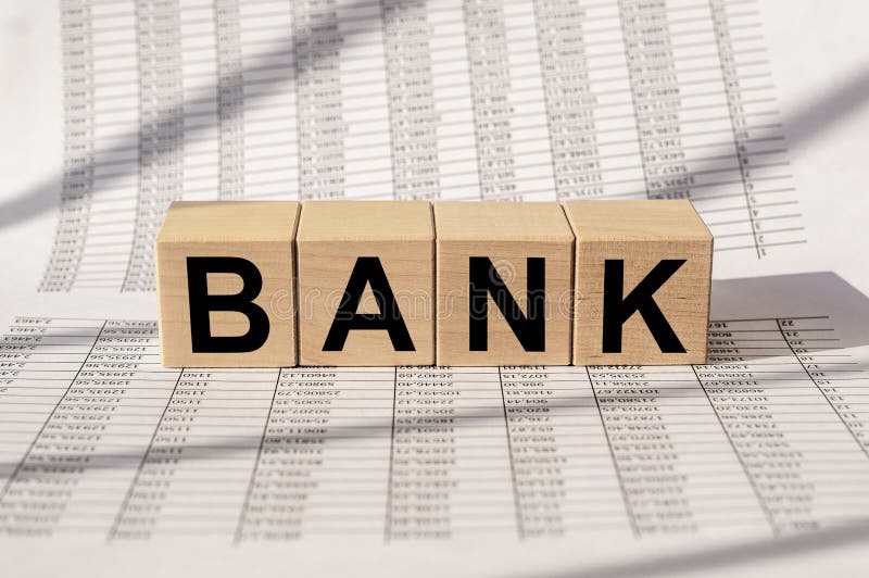 BANK Word on Wooden Cube Blocks on Financial Documents Stock Image ...