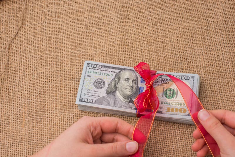 Banknote Bundle of US Dollar Tied with a Ribbon Stock Photo - Image of ...