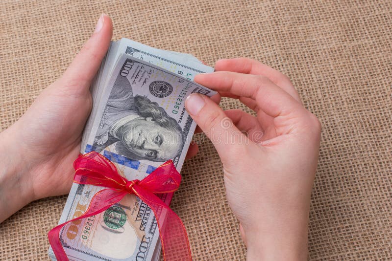 Banknote Bundle of US Dollar Tied with a Ribbon Stock Image - Image of ...