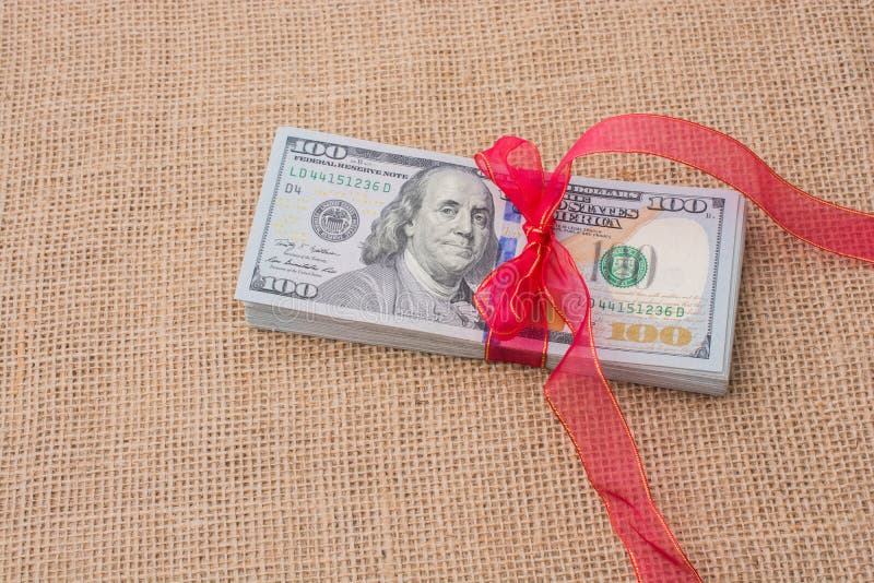 Banknote Bundle of US Dollar Tied with a Ribbon Stock Photo - Image of ...