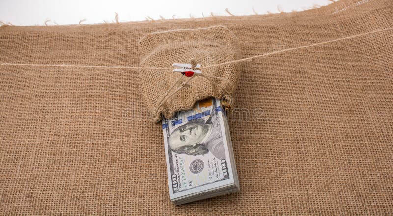Banknote Bundle of US Dollarin a Sack Stock Image - Image of bundle ...