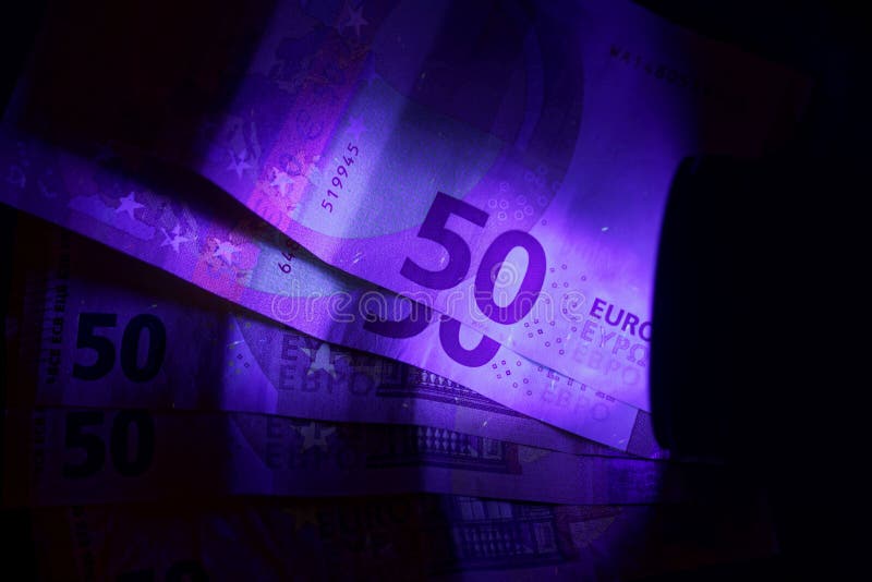Banknotes in UV light. stock image. Image of economic - 109629133