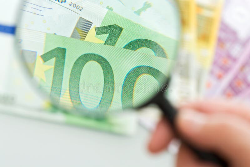 Banknotes and Magnifying Glass Stock Image - Image of hold, credit ...
