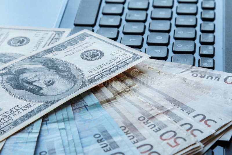 Banknotes Over Laptop Keyboard Stock Photo - Image of notebook, laptop ...
