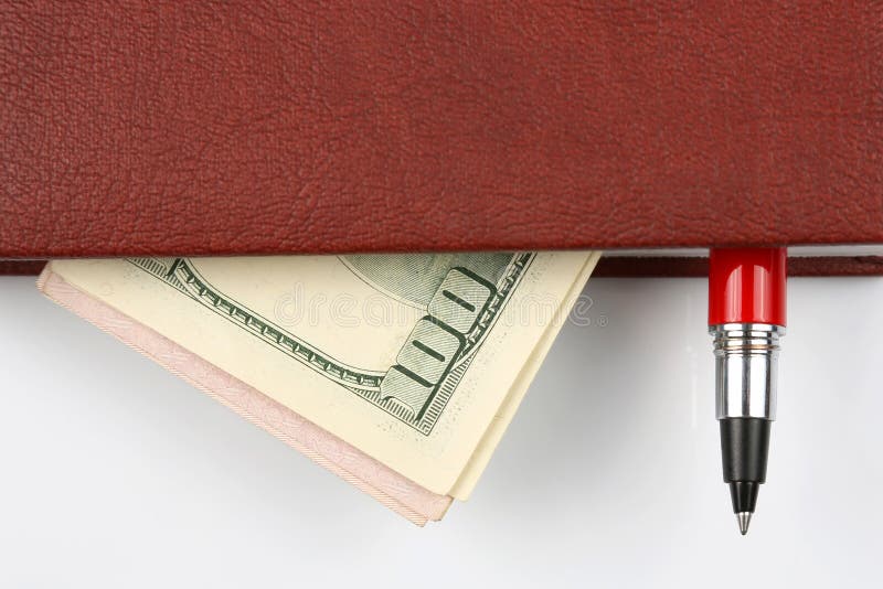 Banknotes and a Red Pen Lying Inside the Notebook Stock Photo - Image ...