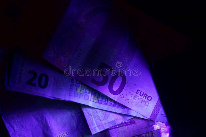 Banknotes in UV light. stock photo. Image of banking - 109629126
