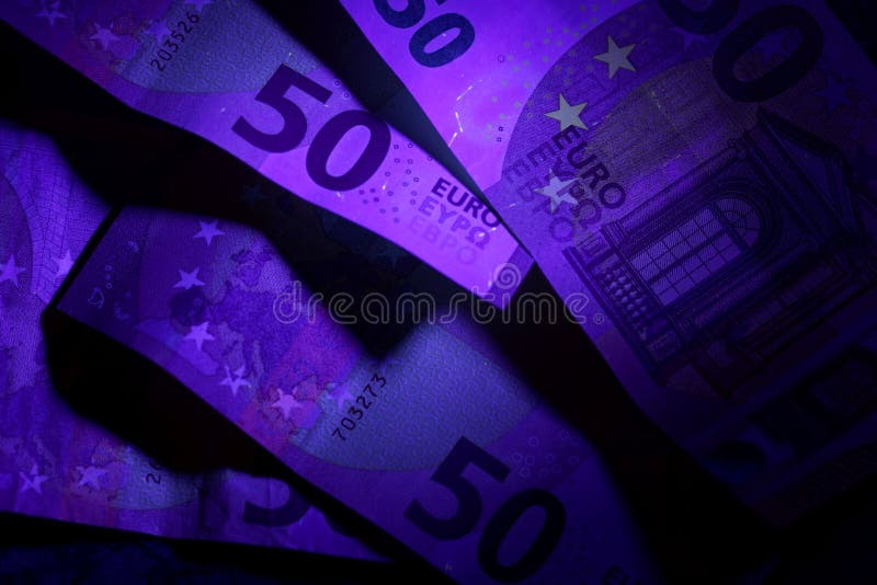 Banknotes in UV light. stock photo. Image of economic - 109629174