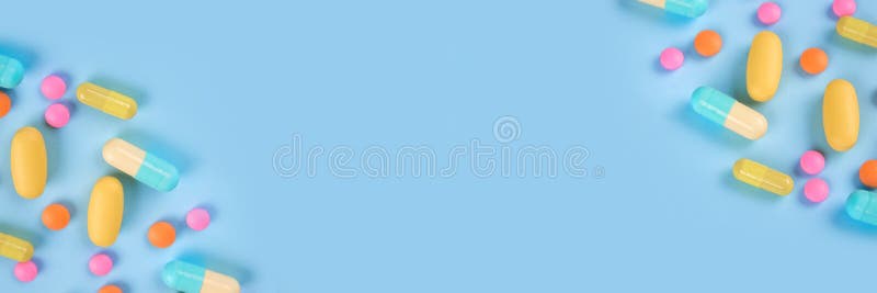 Banner Made with Assorted Medicine Pills, Capsules and Tablets on Blue ...