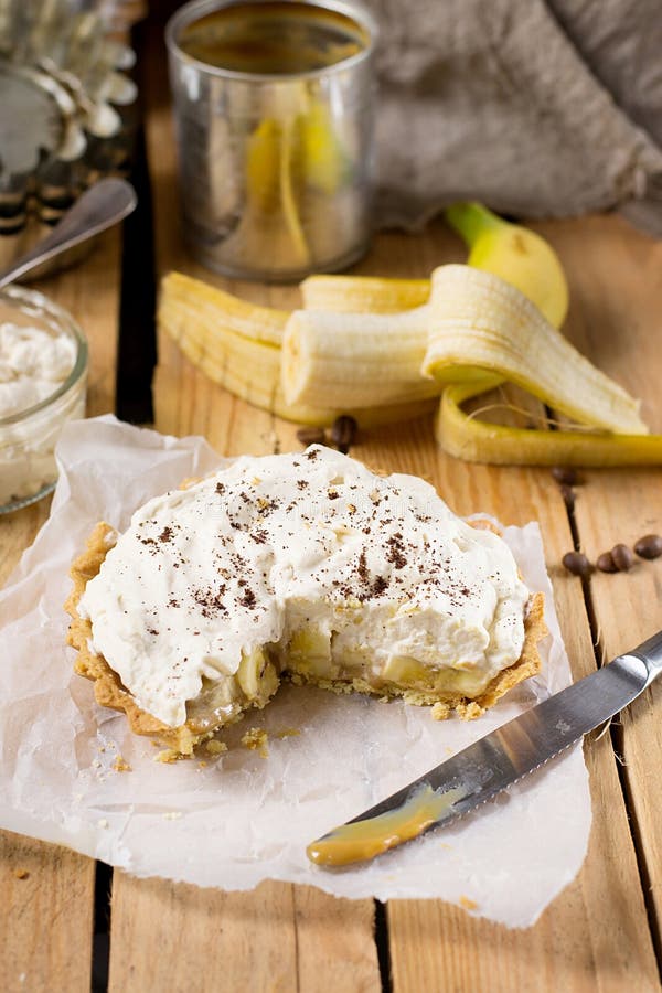 Banoffee Pie with Bananas, Whipped Cream and Toffee Stock Photo - Image ...