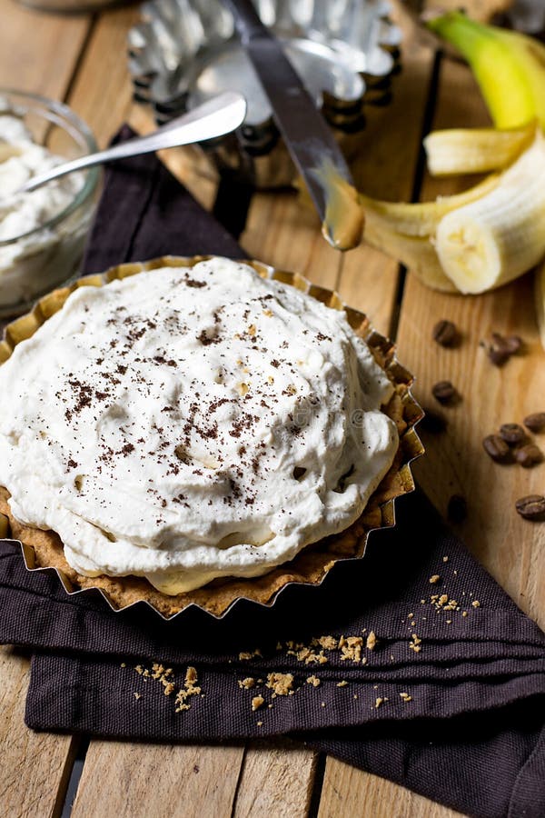Banoffee Pie with Bananas, Whipped Cream and Toffee Stock Photo - Image ...