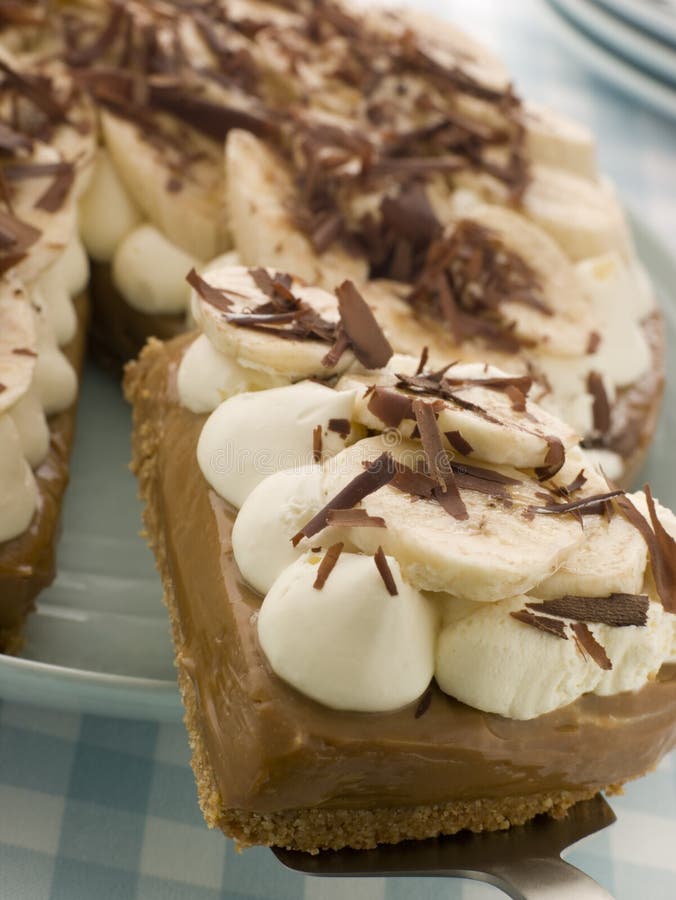 Banoffee Pie with a Slice Being Taken Stock Photo - Image of colour ...