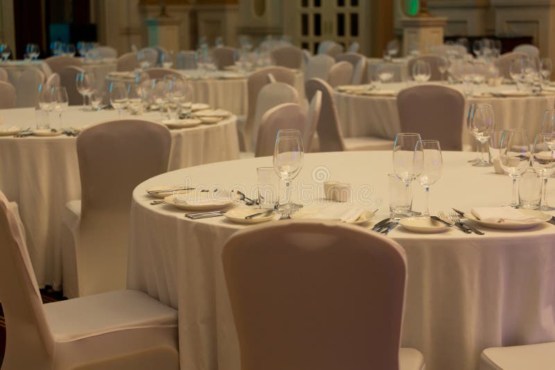 Banquet Hall in the Restaurant with Table Setting. Concept: Service ...