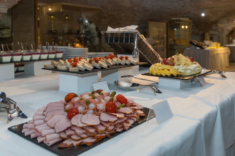 Banquet Table at the Celebration. Prepared Food on the Tables Editorial ...