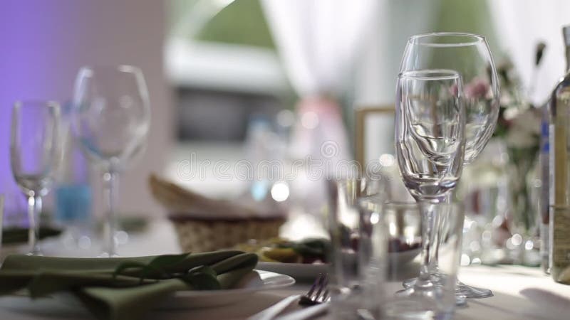 Banquet Table Setting with Glasses and Bottles of Alcohol. Background ...